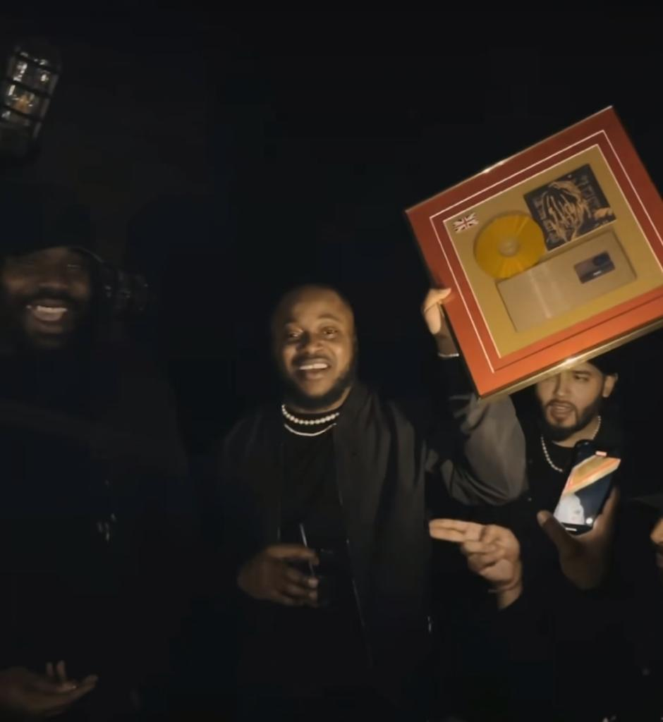 Izy toasting to success with Gold certification